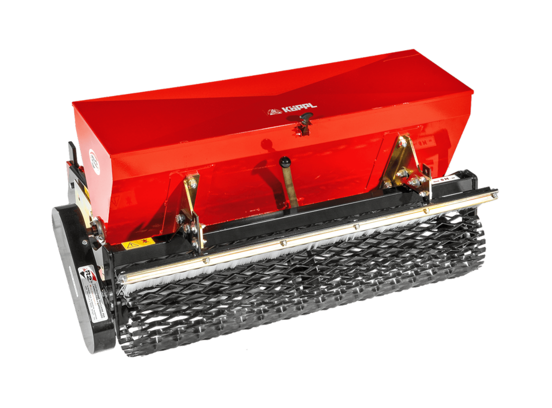 Rotary harrow with seed box